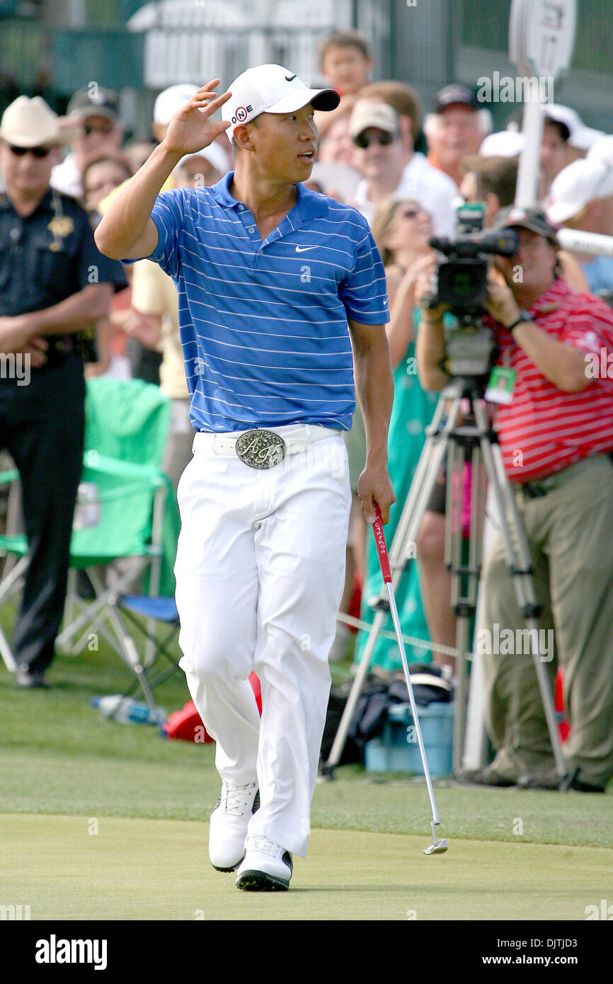 Anthony Kim salutes the crowd on the 17th green. Anthony Kim is the ...