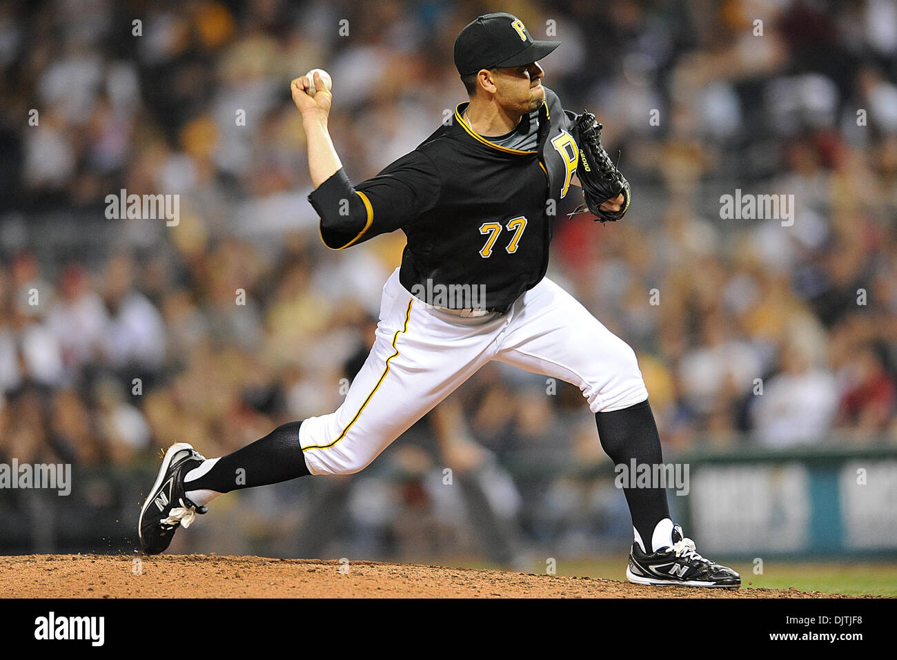 Pirates relief pitcher #77 Carrasco throws a pitch in action at PNC ...