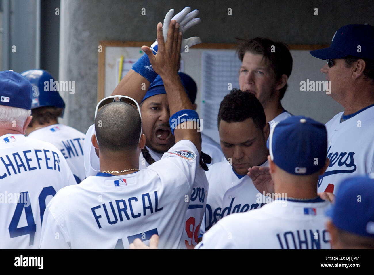Manny Ramirez receives congratulations fromteam mates after connecting ...