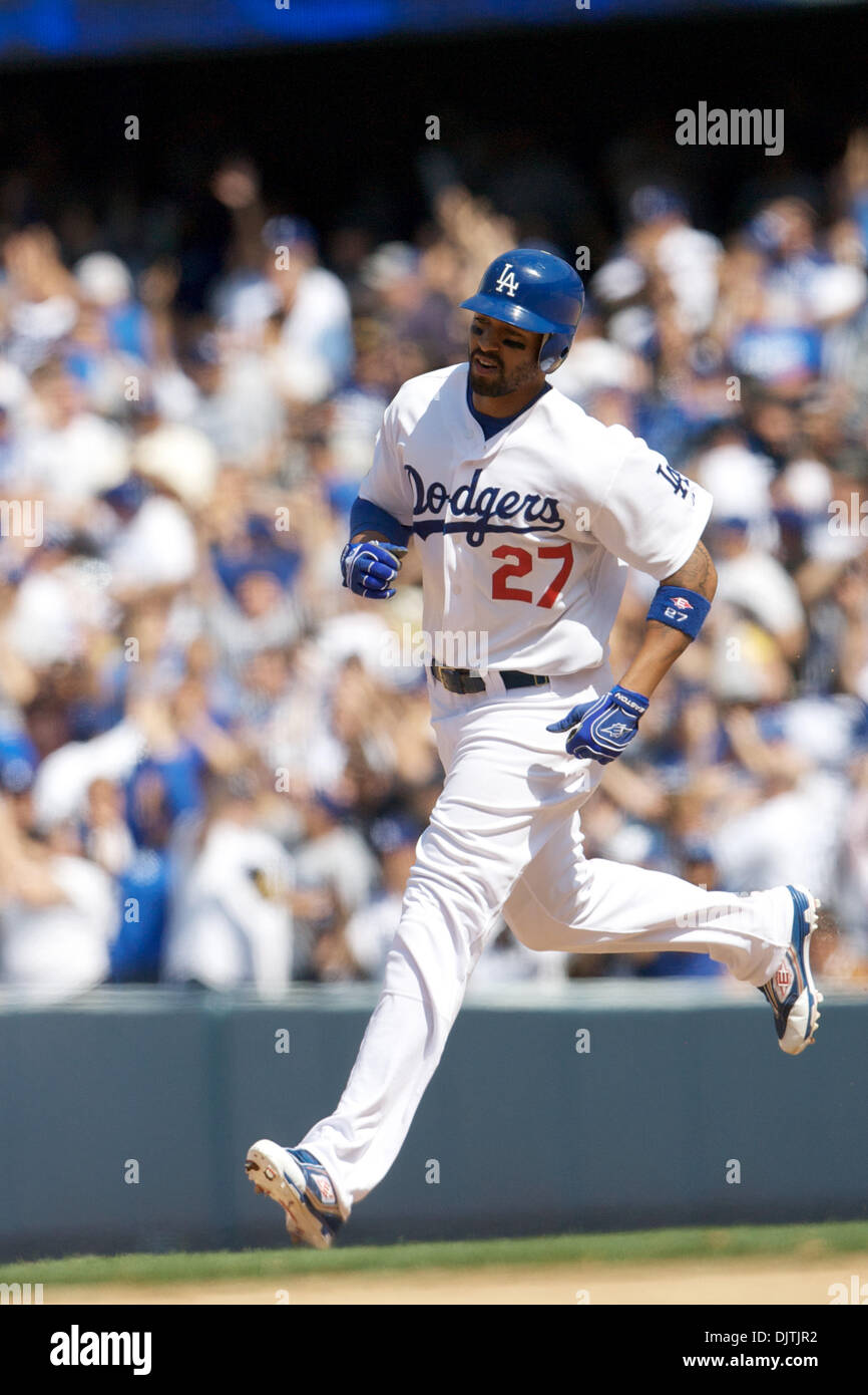 Los Angeles Dodger center fielder Matt Kemp rounds second base after ...