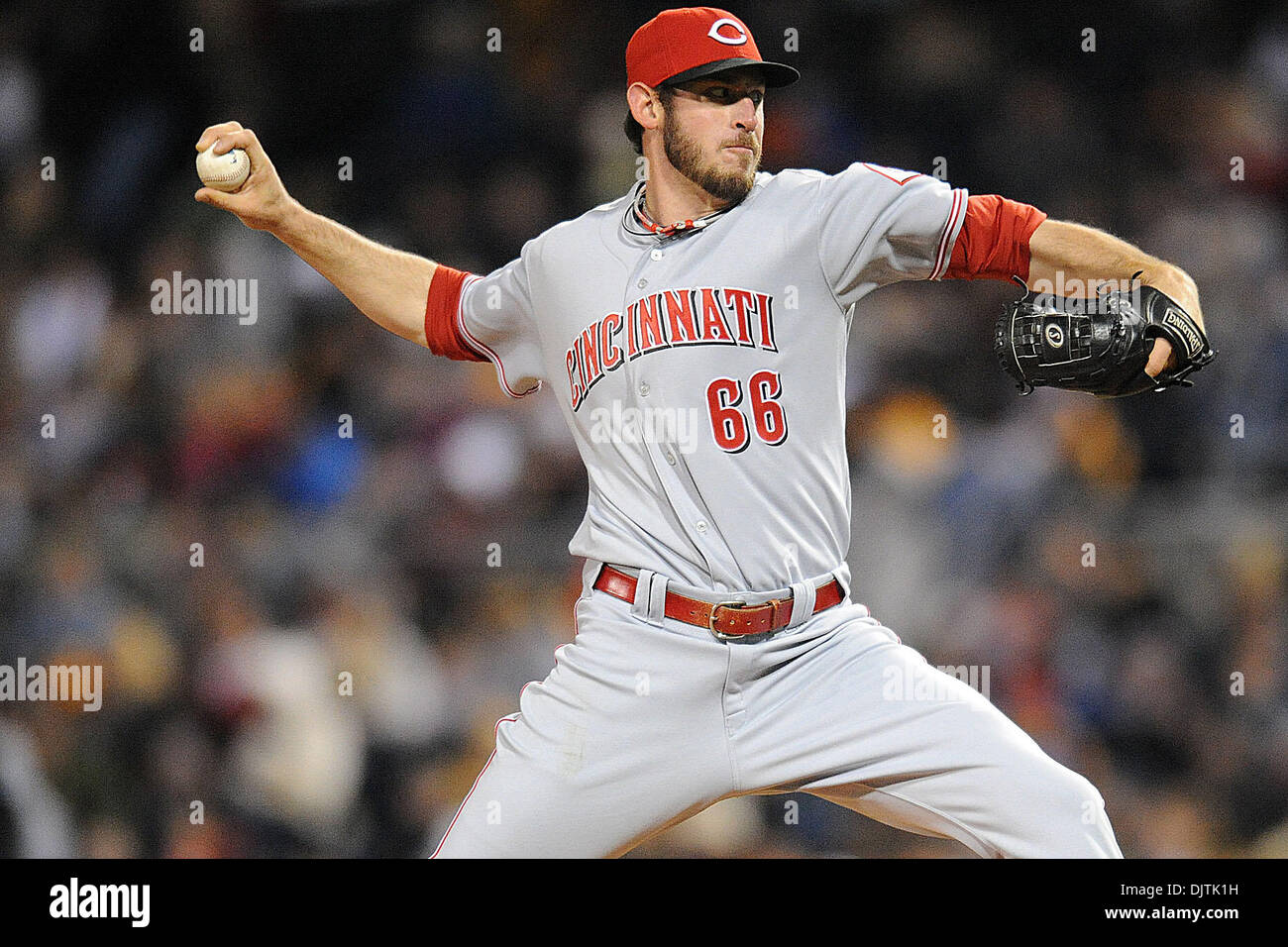 Reds tall relief pitcher Ondrusek (66) gets set to throw a pitch in a ...