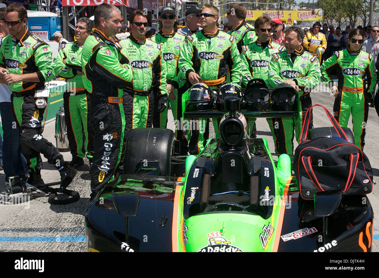 Team GoDaddy.com gathers at the #7 car prior to the start of the 36th ...