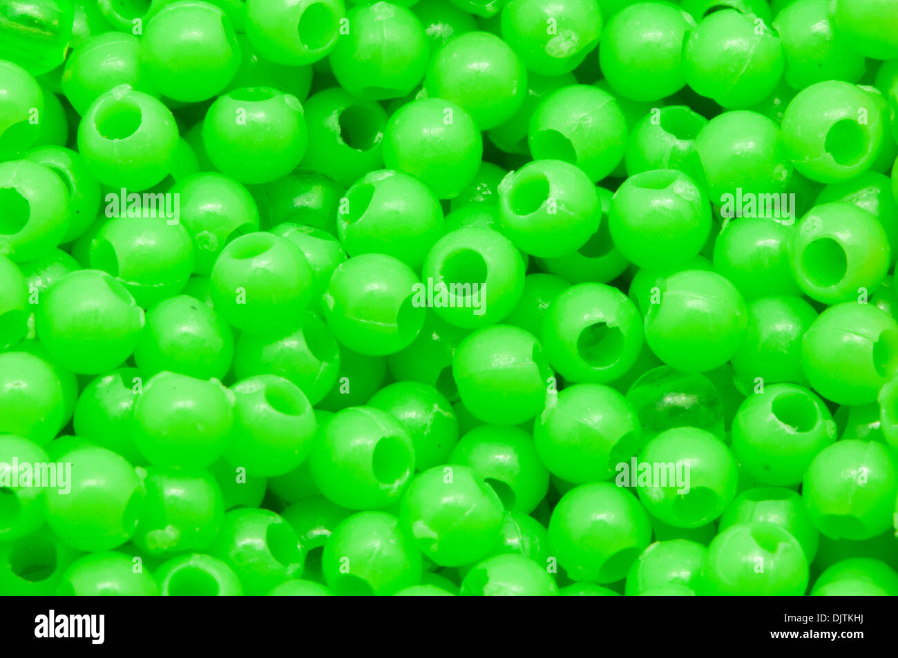 green balls on a white background Stock Photo - Alamy