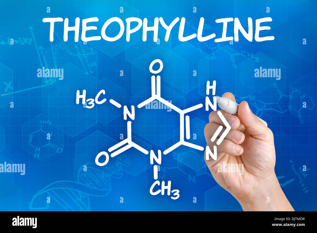 Hand with pen drawing the chemical formula of theophylline Stock Photo ...