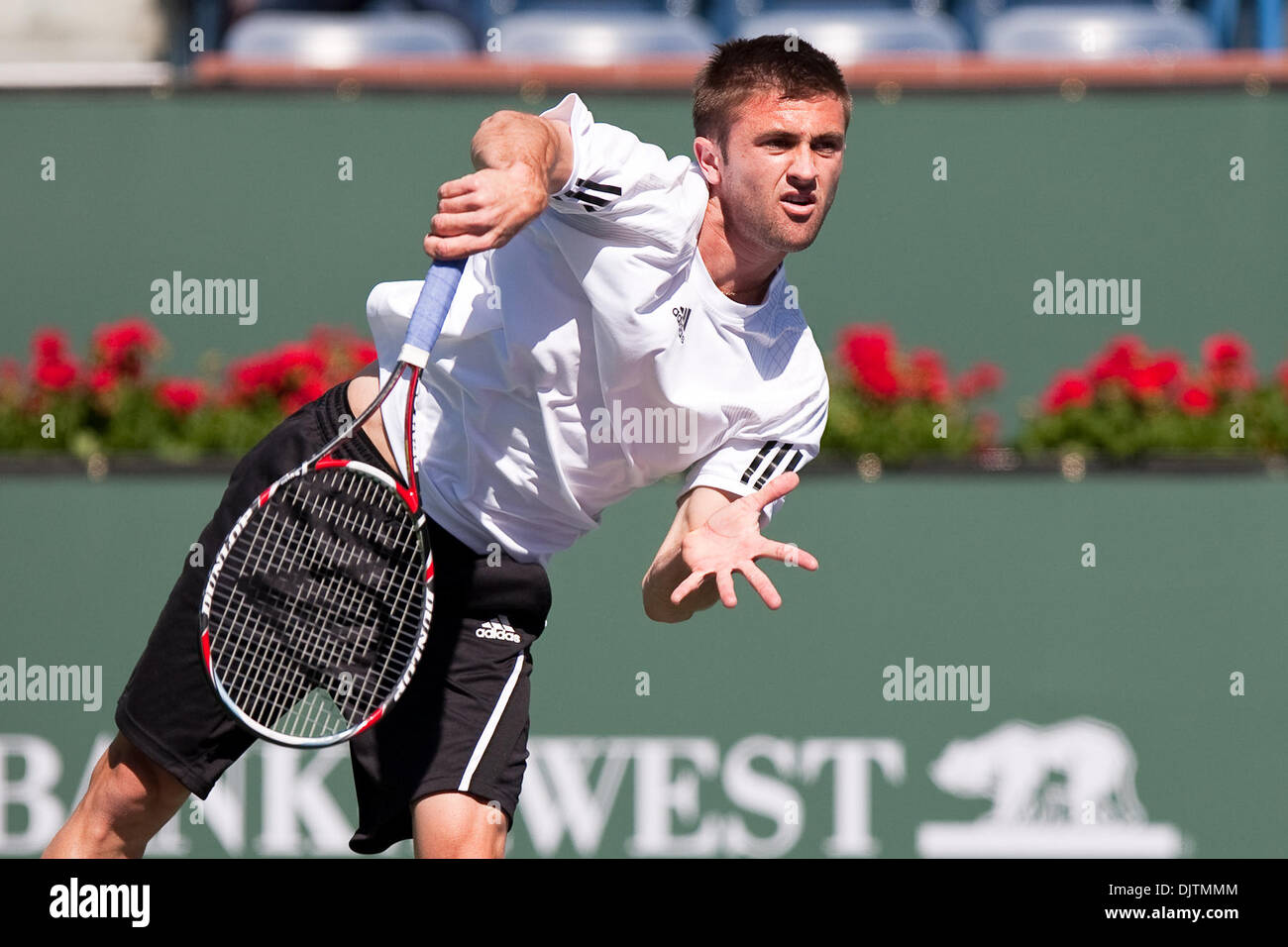 Tim Smyczek (USA) in match against Carlos Moya (ESP) at the 2010 BNP ...