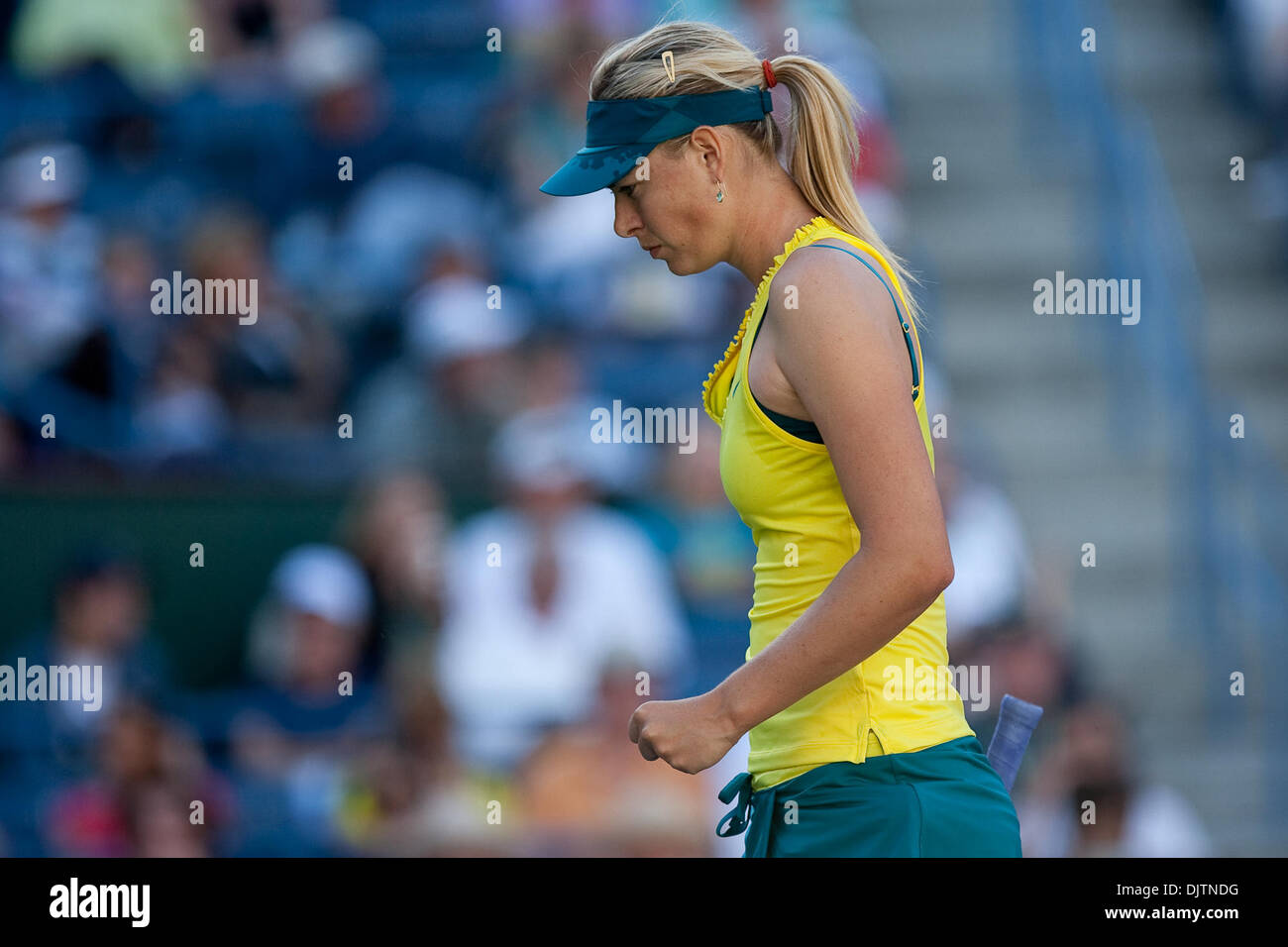 Jie ZHENG (CHN) blue outfit vs Maria SHARAPOVA (RUS) yellow shirt at ...