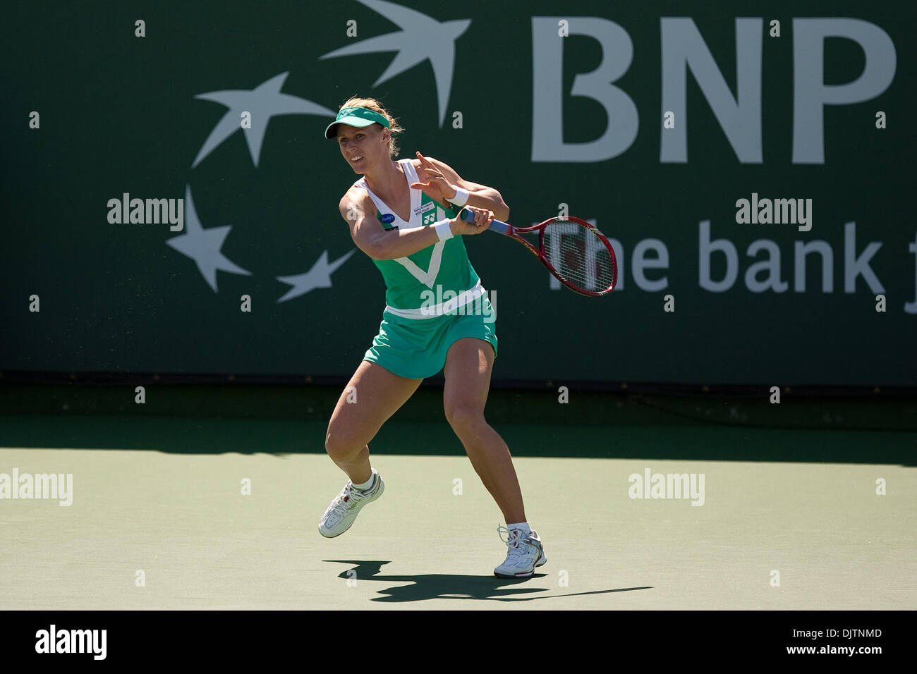 Elena DEMENTIEVA (RUS) returns a shot against Aravane REZAI (FRA) at ...