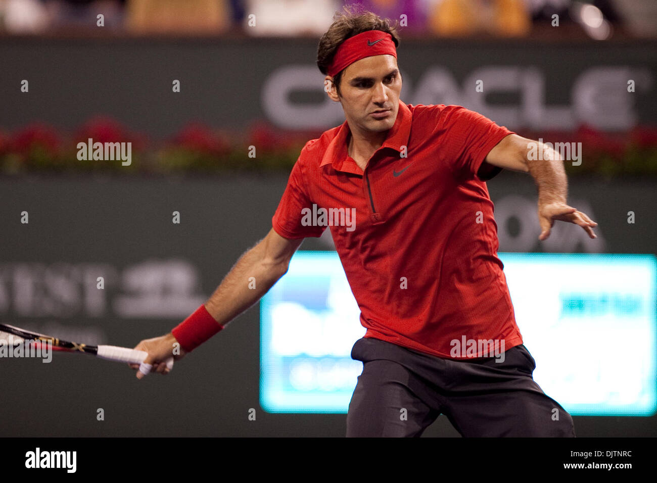 Roger FEDERER (SUI) returns a shot against Marcos BAGHDATIS (CYP) at ...