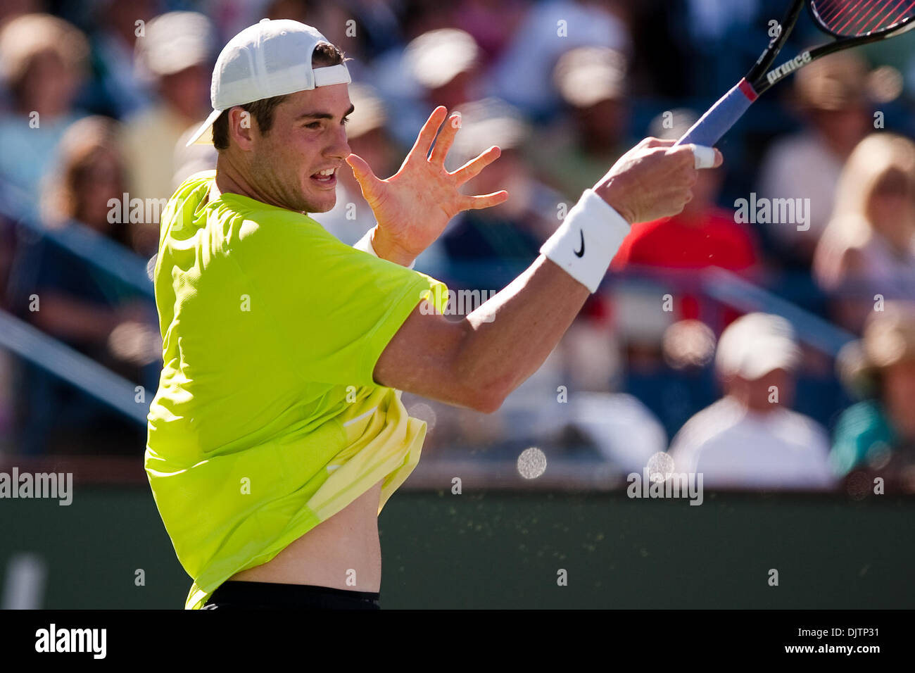 John Isner (USA) returns a shot against Rafael Nadal (ESP) at the 2010 ...