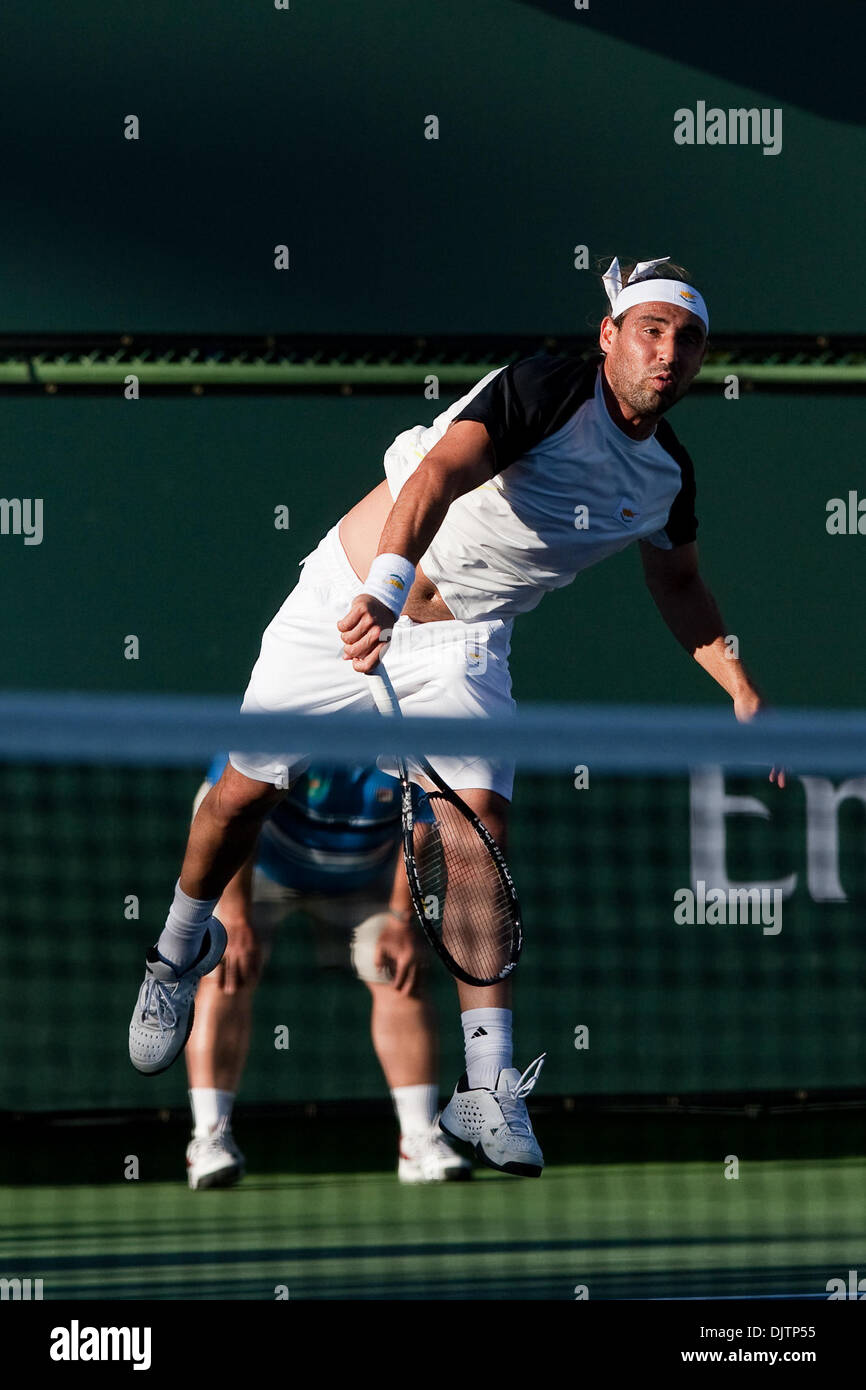 Marcos Baghdatis (CYP) serves against Tommy Robredo (ESP) at the 2010 ...