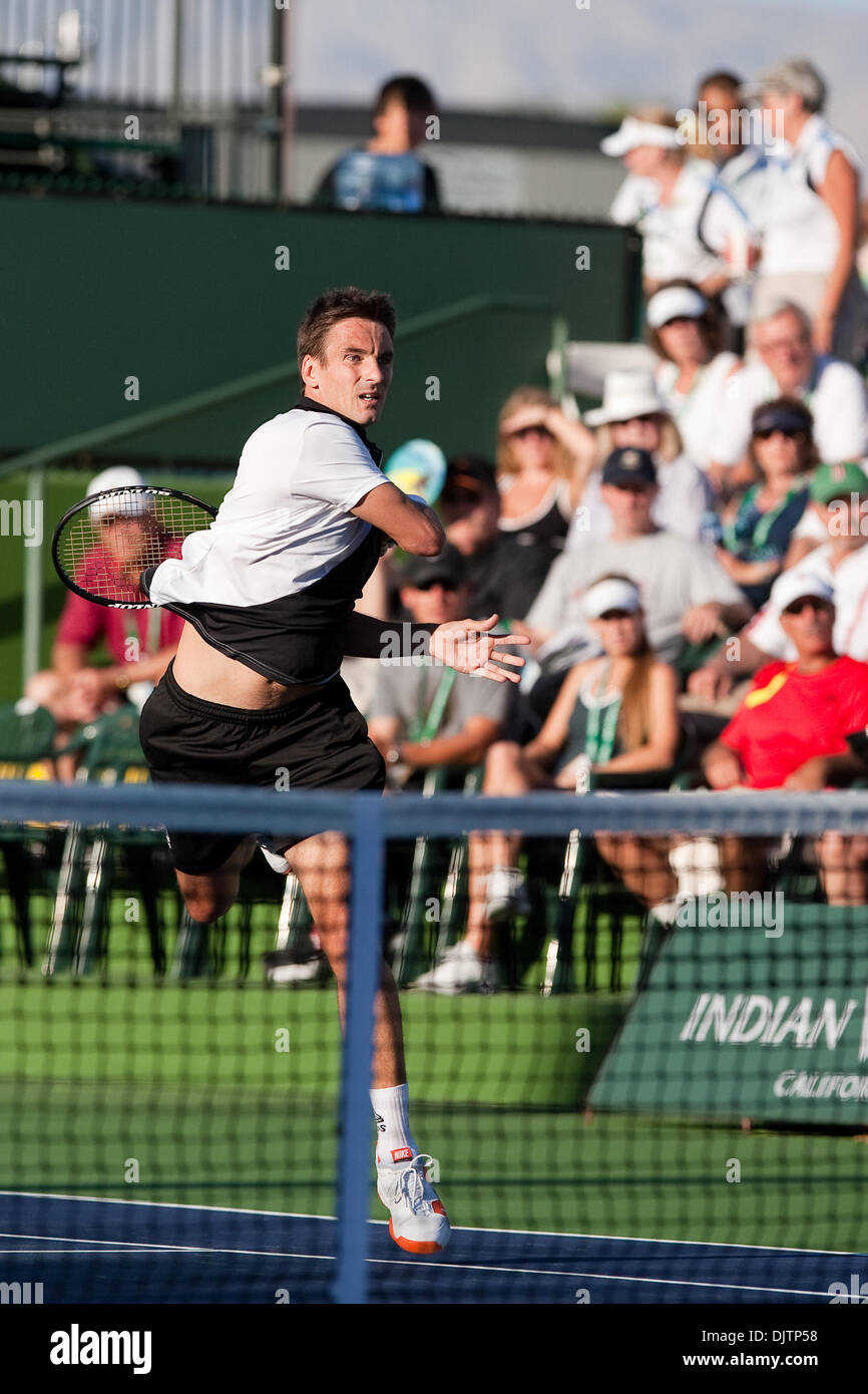 Tommy Robredo (ESP) returns a shot against Marcos Baghdatis (CYP) at ...