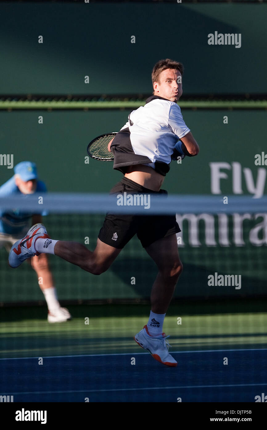 Tommy Robredo (ESP) returns a shot against Marcos Baghdatis (CYP) at ...