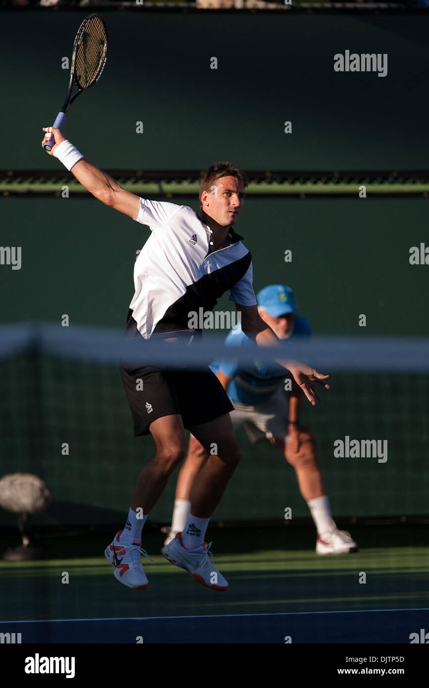 Tommy Robredo (ESP) returns a shot against Marcos Baghdatis (CYP) at ...
