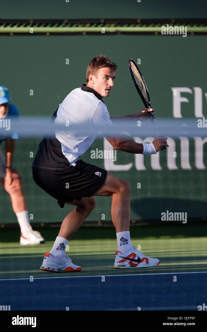 Tommy Robredo (ESP) returns a shot against Marcos Baghdatis (CYP) at ...