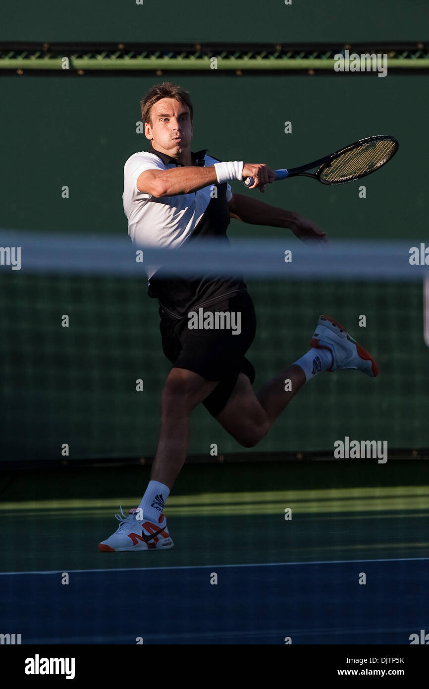 Tommy Robredo (ESP) returns a shot against Marcos Baghdatis (CYP) at ...