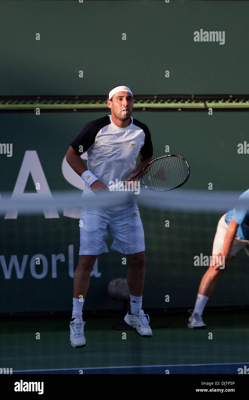 Marcos Baghdatis (CYP) returns a shot against Tommy Robredo (ESP) at ...
