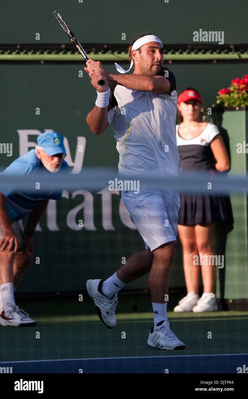Marcos Baghdatis (CYP) returns a shot against Tommy Robredo (ESP) at ...