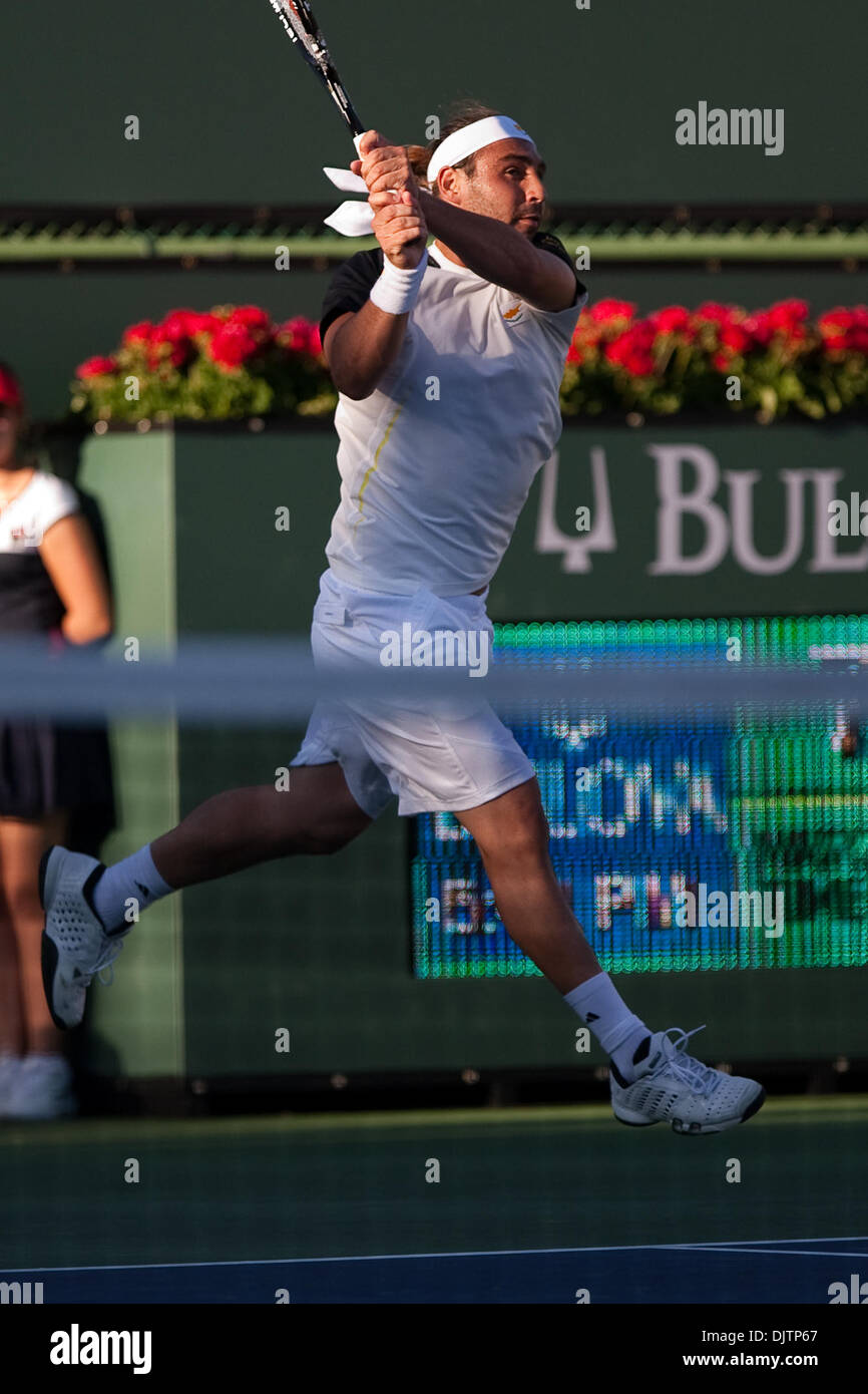 Marcos Baghdatis (CYP) returns a shot against Tommy Robredo (ESP) at ...