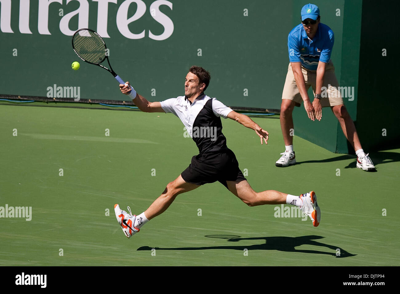Tommy Robredo (ESP) returns a shot to Andy Roddick (USA) at the 2010 ...
