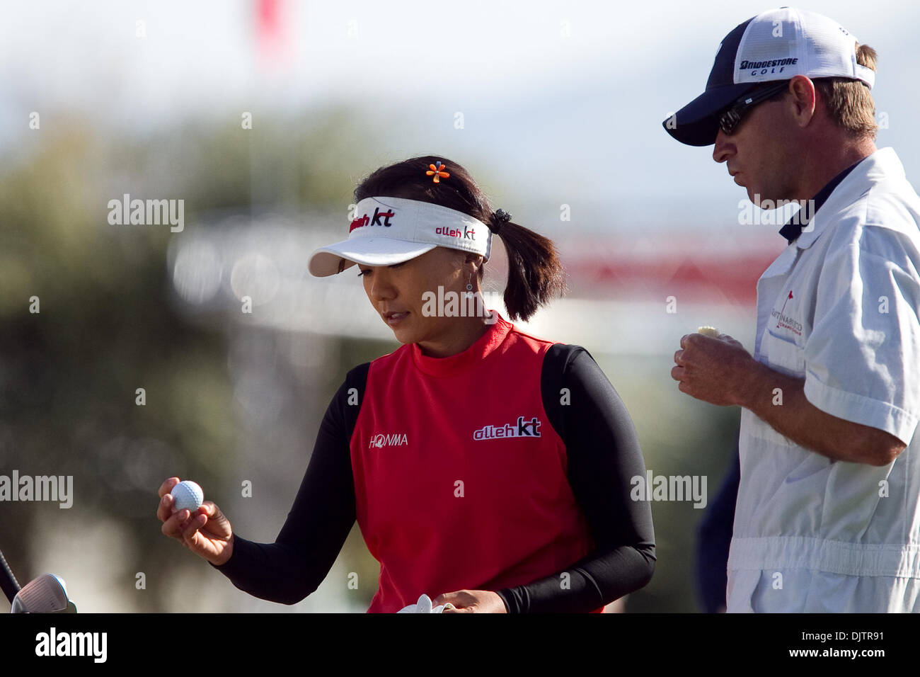 Meena Lee of South Korea prepares to tee off at the 1st hole of the ...