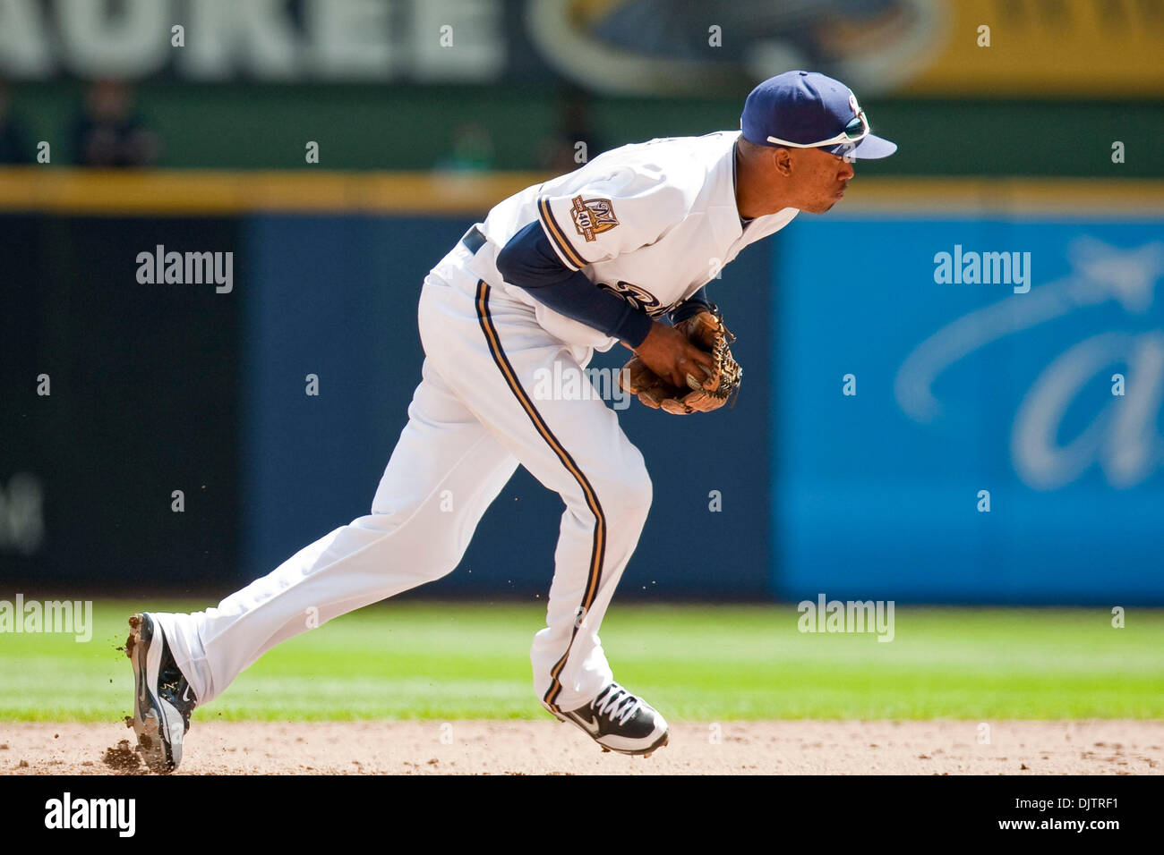 Milwaukee Brewers shortstop Alcides Escobar #21 runs down a ground ball ...