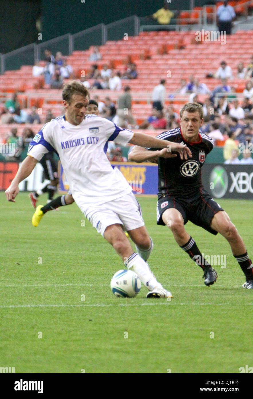 Kansas City defender Jimmy Conrad (#12) dribbles the ball during the ...