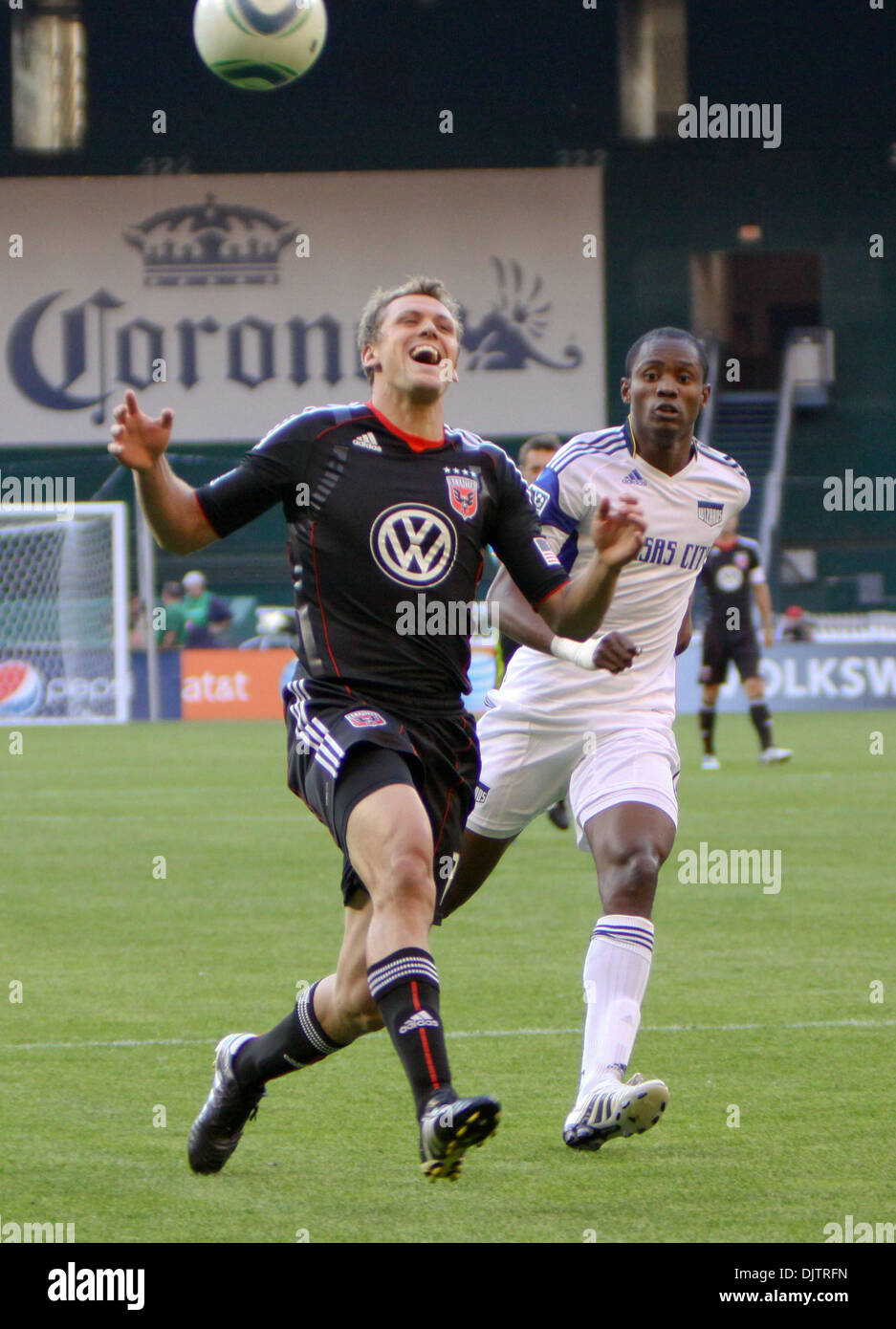 DC United forward Adam Christman (#7) laughs, realizing he committed a ...