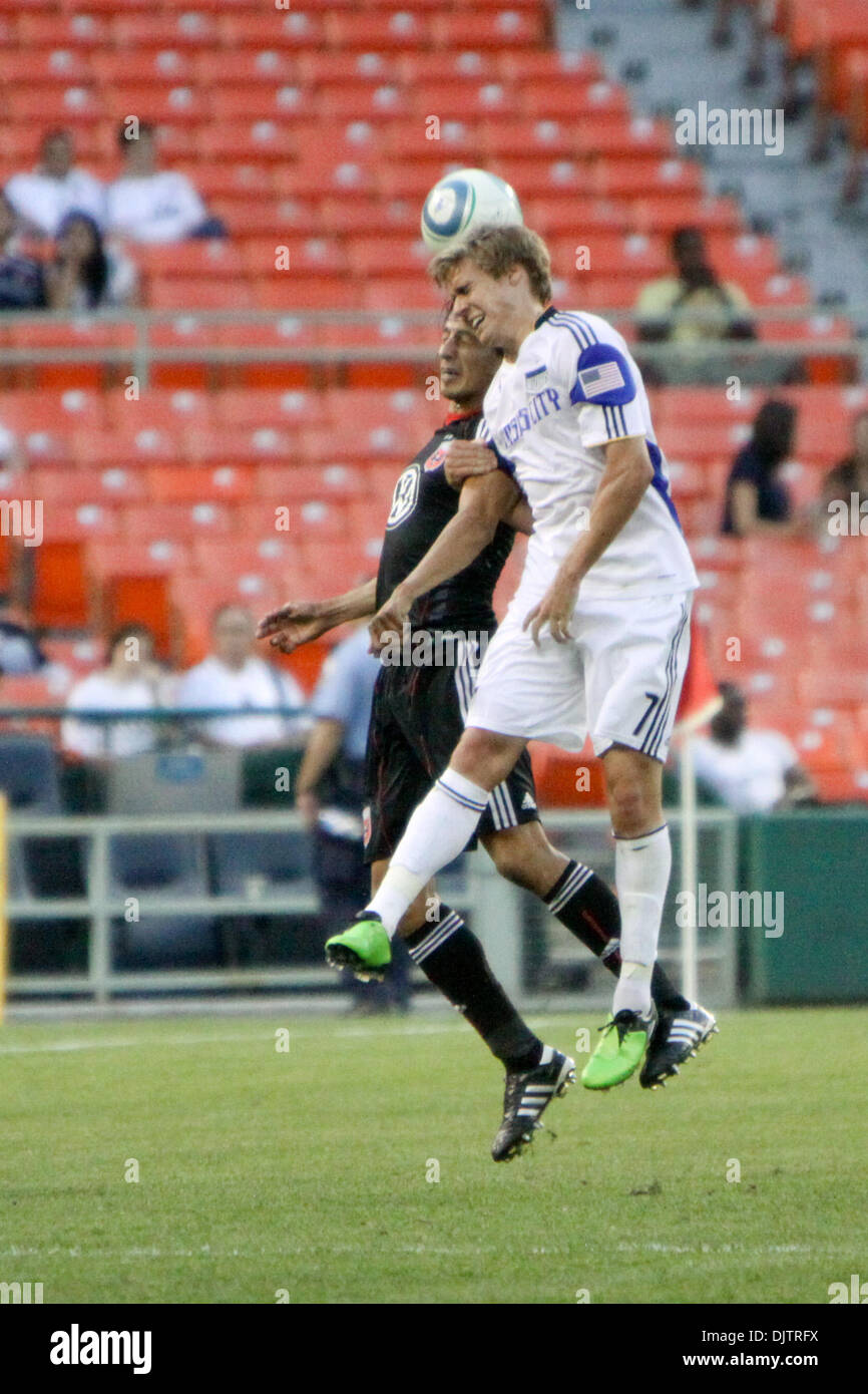 Kansas City Wizards midfielder Chance Myers (#7) goes up for the ball ...