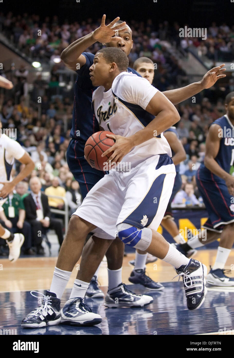Notre Dame Forward Tyrone Nash (1) drives to the basket in game action ...