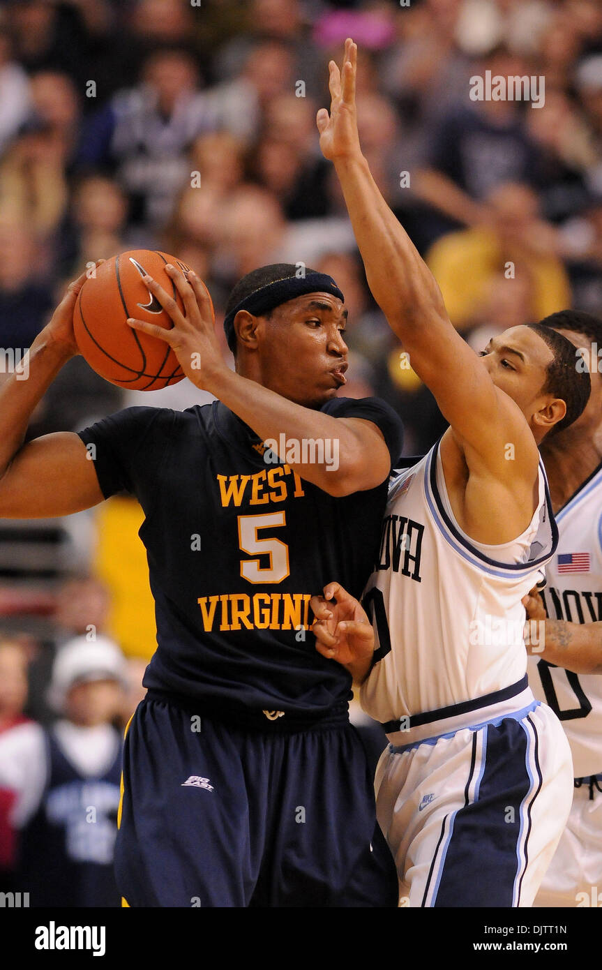 West Virginia forward Kevin Jones #5 is guarded by Villanova guard ...
