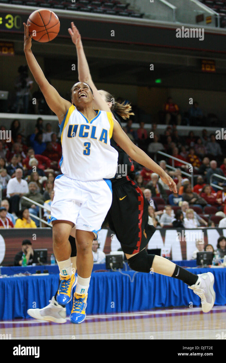 13 March 2010: Darxia Morris (L) blows a breakaway lay up due to the ...