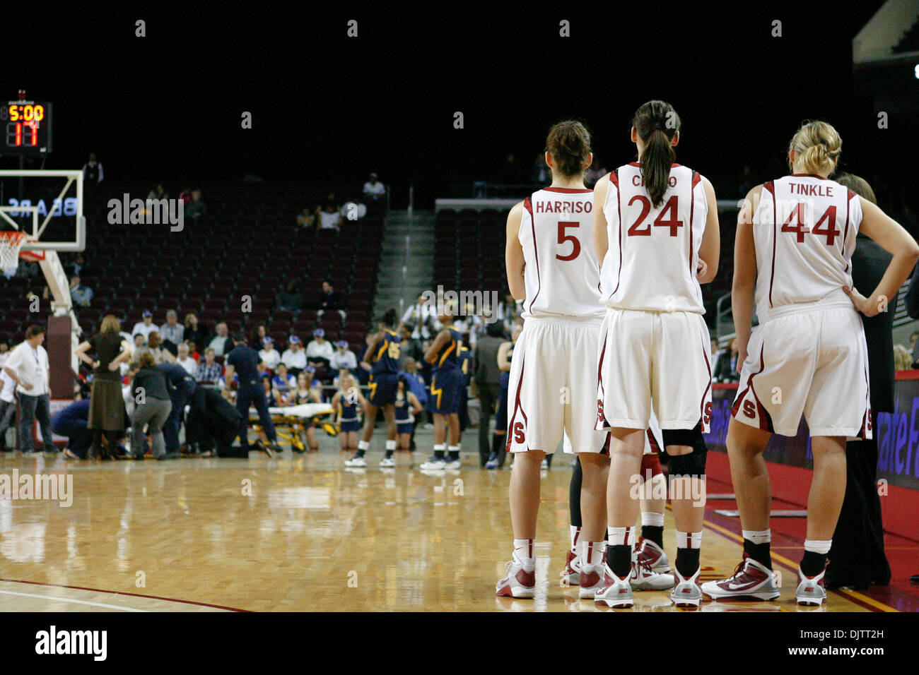 13 March 2010: Stanford players (R) watch as Alexis Gray-Lawson gets ...