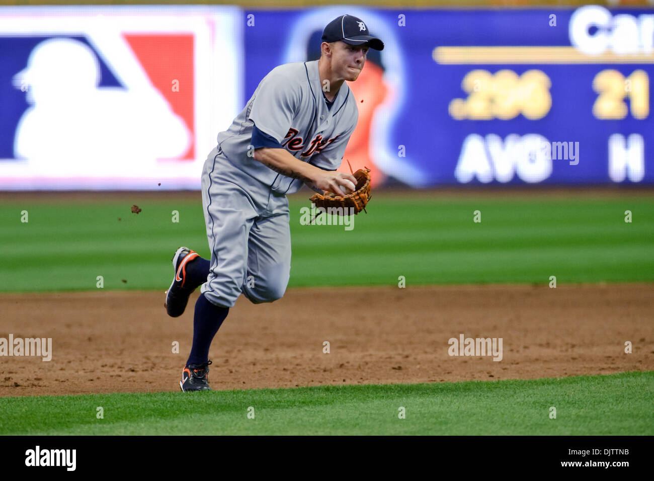 Detroit Tigers third baseman Brandon Inge (15) makes a play on a ground ...