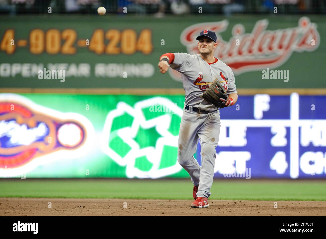 St. Louis Cardinals second baseman Skip Schumaker (55) makes a throw to ...