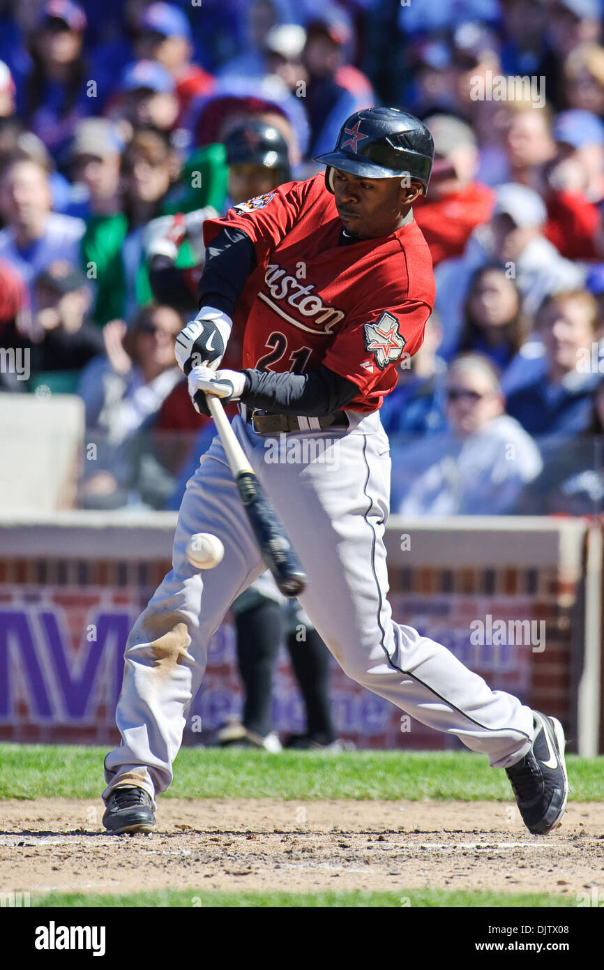 Houston Astros center fielder Michael Bourn (21) connects at the plate ...