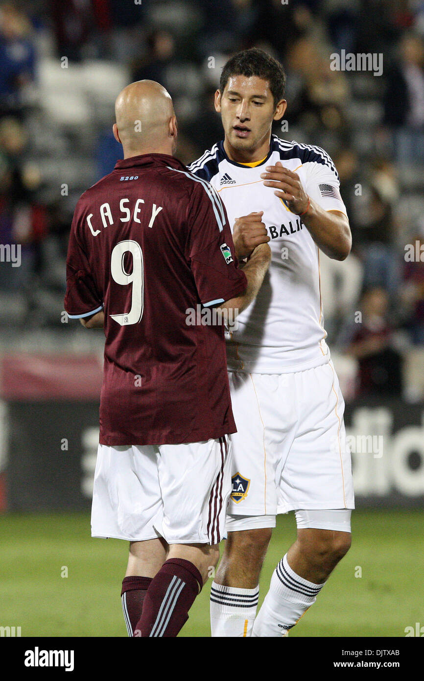Colorado Rapids' Conor Casey (9) congratulates the Galaxy's Omar ...