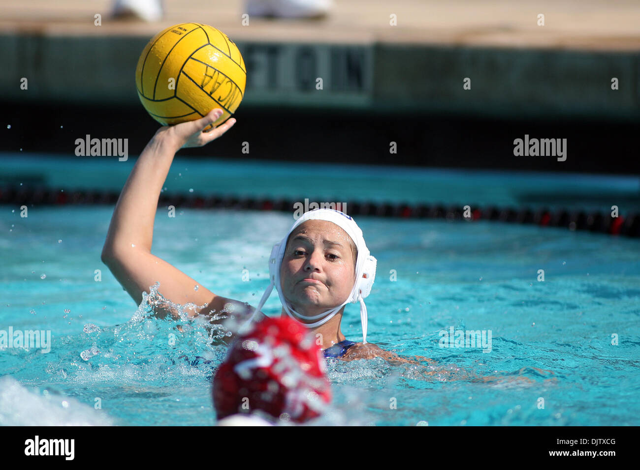 Pomona-Pitzer Sarah Woods looks for an open pass against Stanford ...