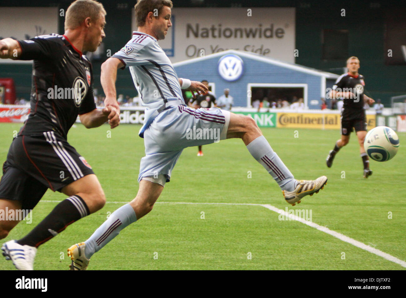 DC United forward Danny Allsopp (#9) races Colorado Rapids defender ...