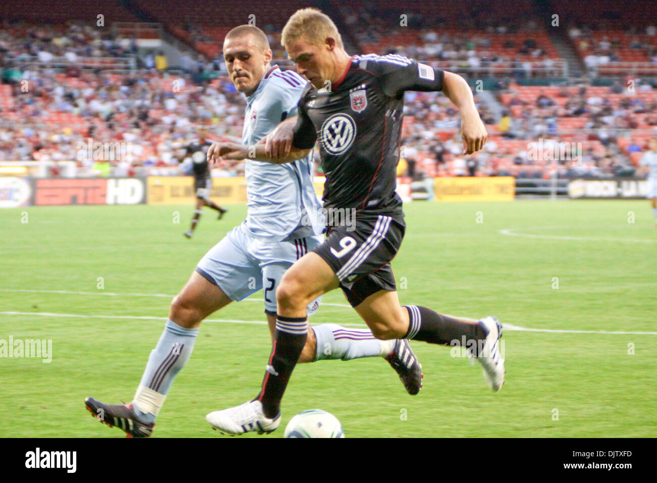 DC United forward Danny Allsopp (#9) fights off Colorado Rapids ...