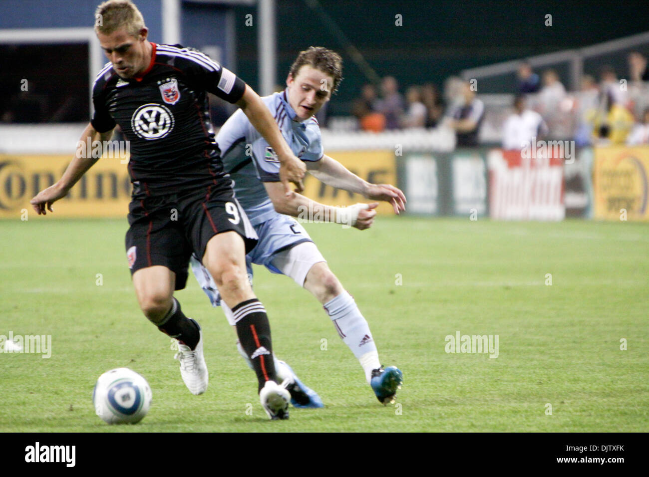 DC United forward Danny Allsopp (#9) goes up against Colorado Rapids ...