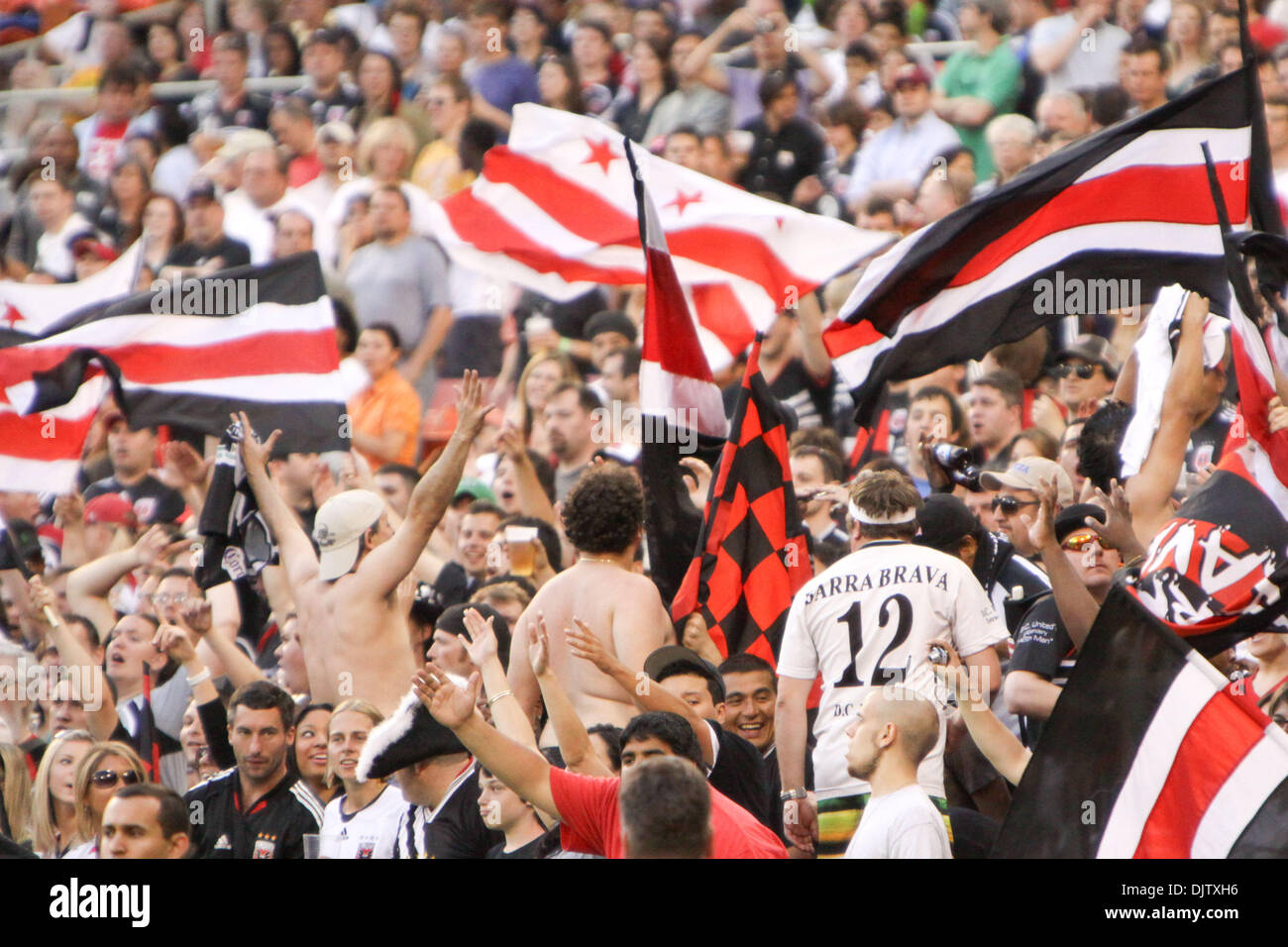 DC United fans known as the Barra Brava cheer on their team during the ...