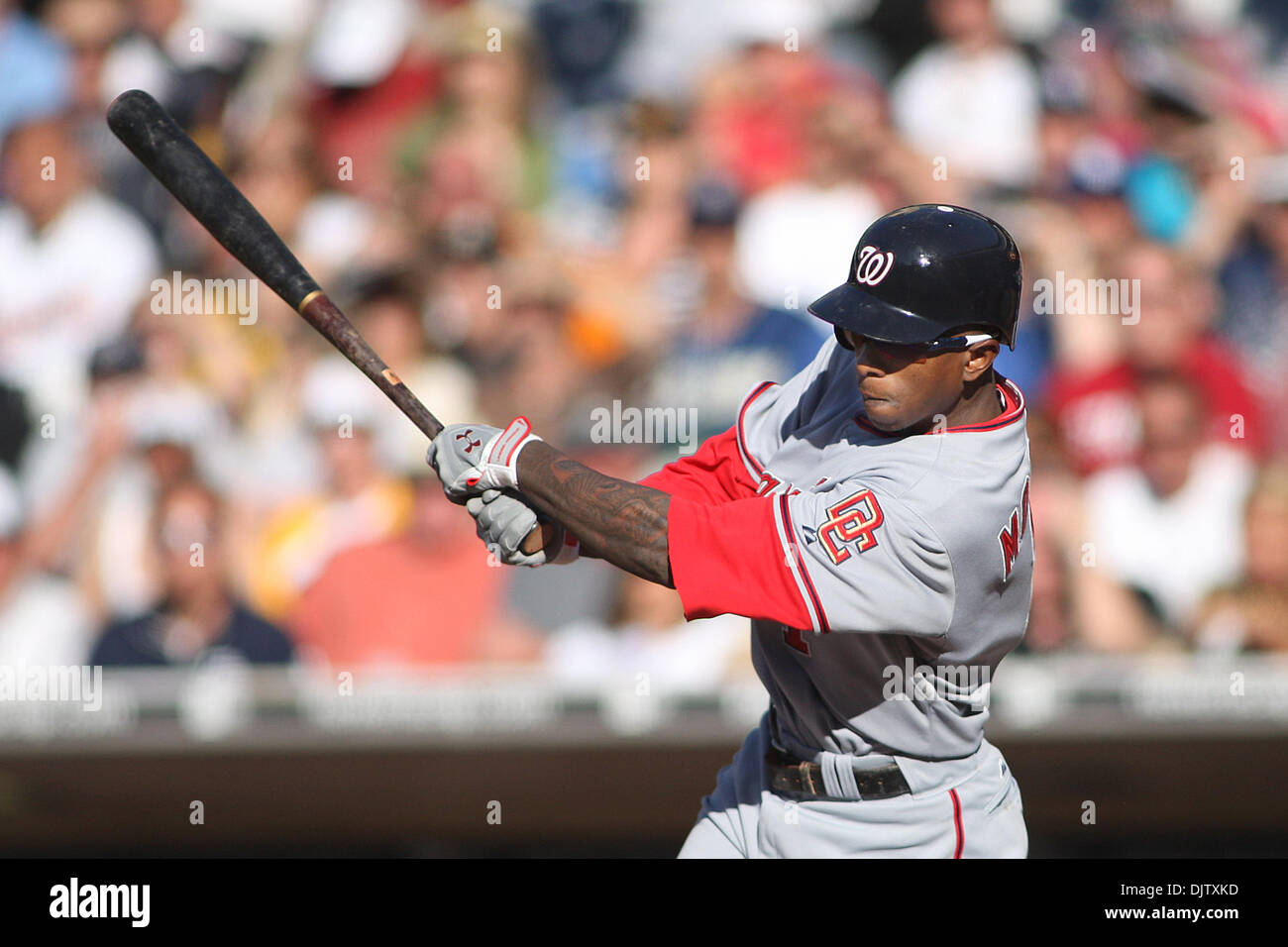 Washington Nationals Nyjer Morgan swings on a pitch from San Diego ...