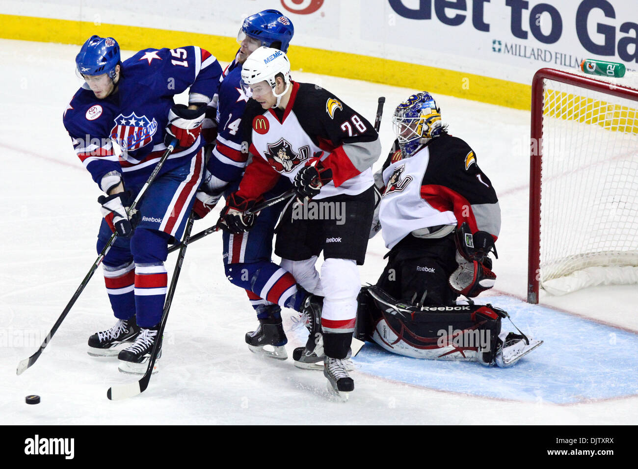 Rochester Americans Victor Oreskovich (15), Michael Duco (14), and ...
