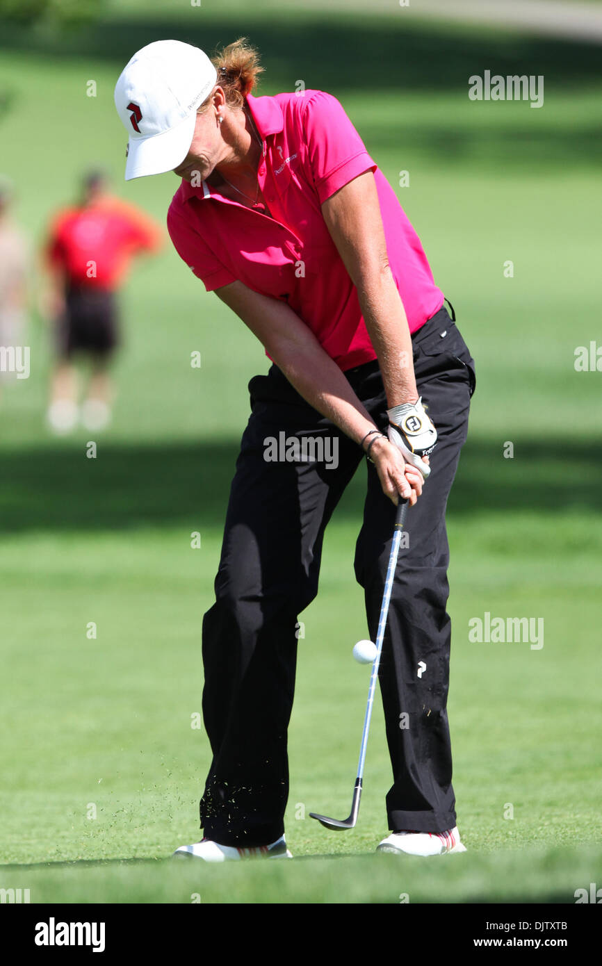 Helen Alfredsson of Sweden chipped her ball onto the 18th green during ...