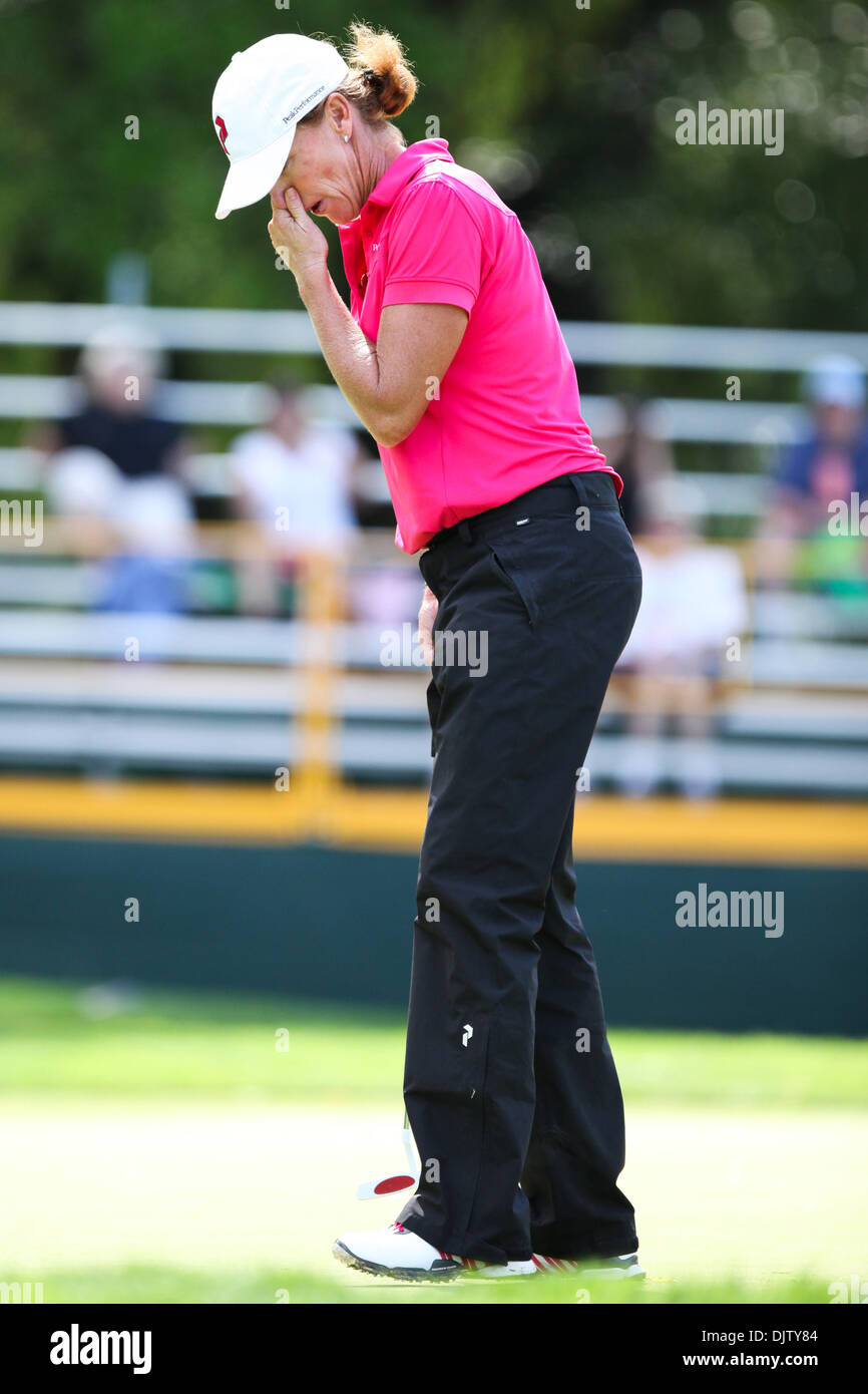 Helen Alfredsson of Sweden reacts after missing her putt on the 2nd ...
