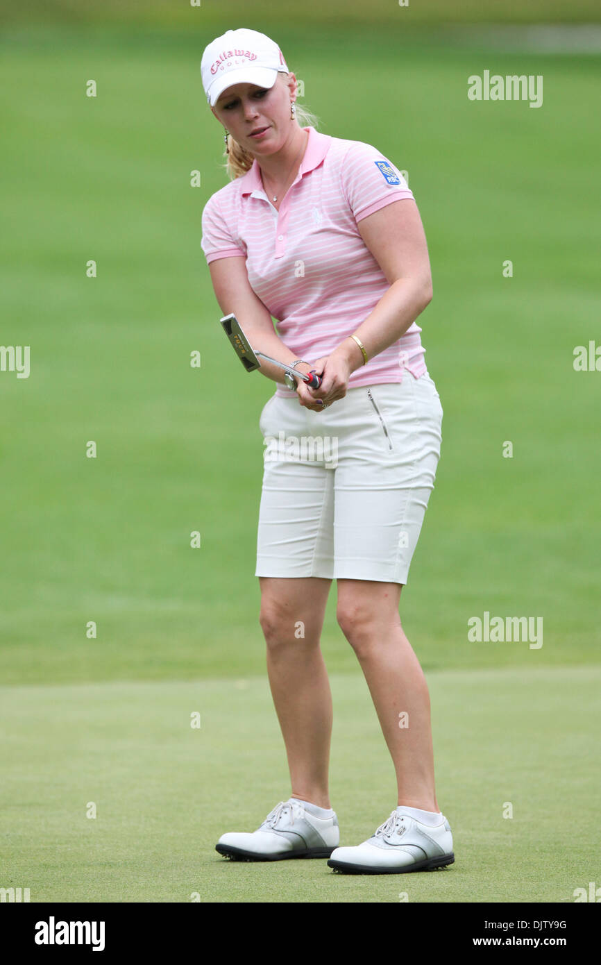 Morgan Pressel of USA reacts after missing her putt on the 7th hole ...