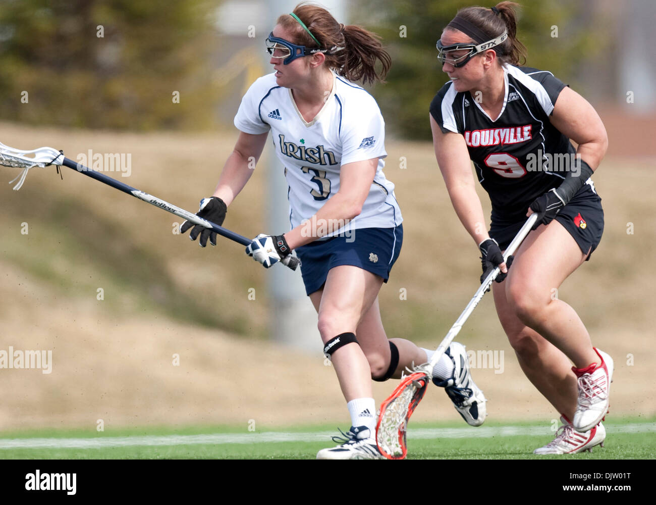 Notre Dame Midfielder Jackie Doherty (3) and Louisville Defenseman ...