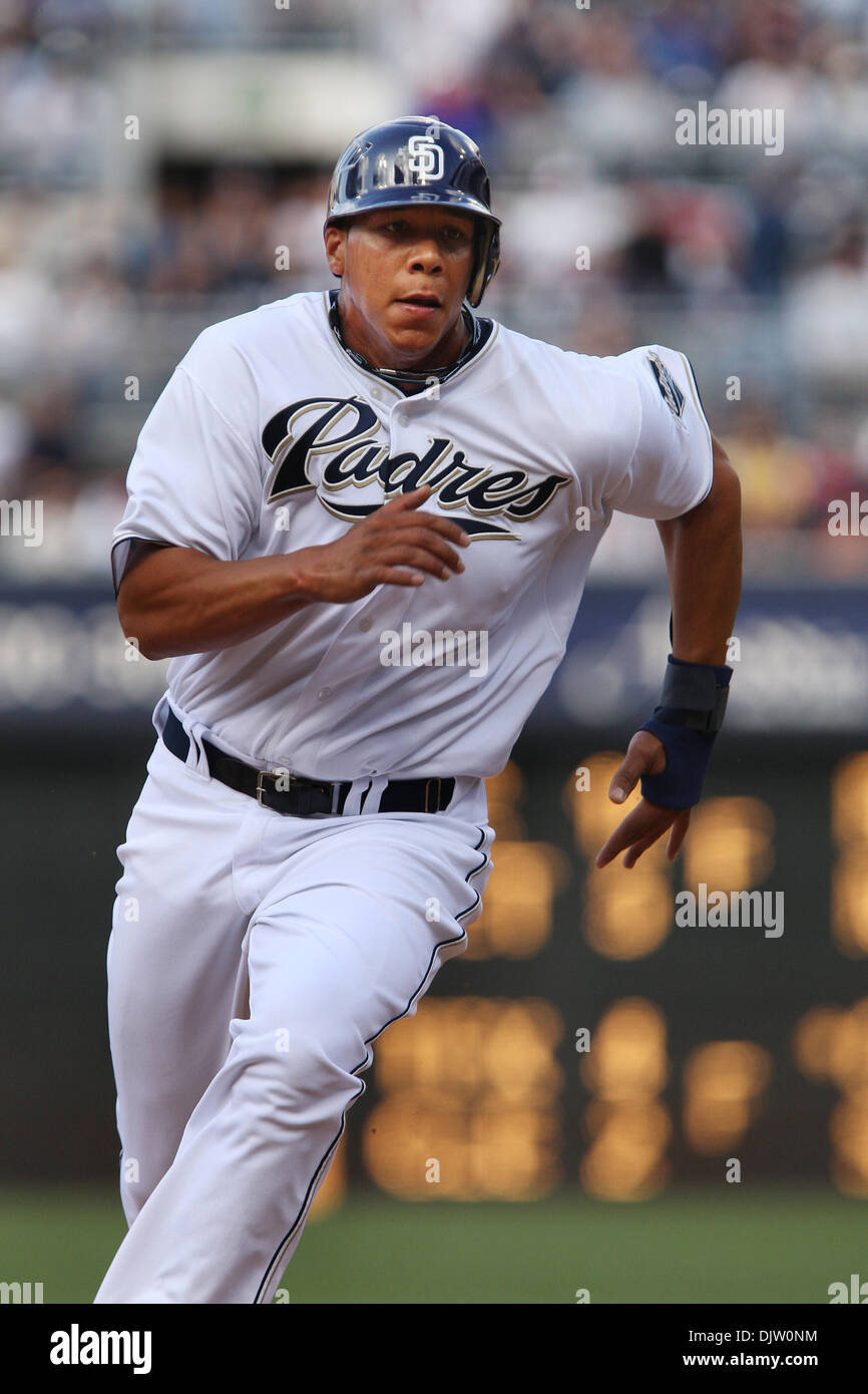 San Diego Padres Kyle Blanks heads for home on a deep single by Chase ...