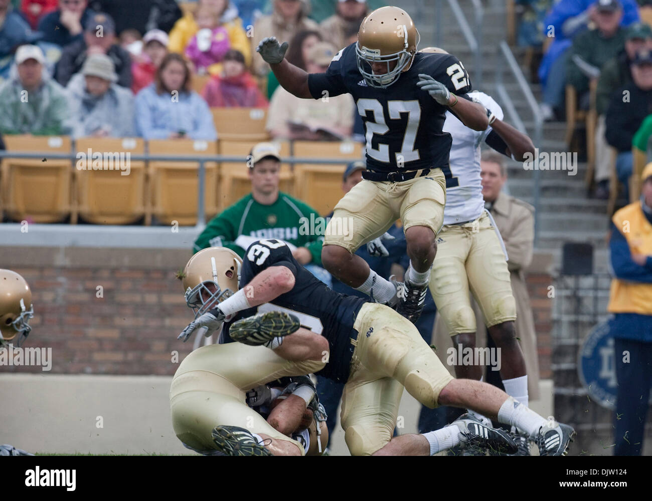 Notre Dame Cornerback E.J. Banks (#27) jumps over the pile after Notre ...