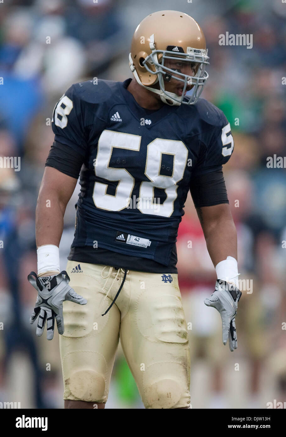 Notre Dame Outside Linebacker Brian Smith (#58) looks into the ...